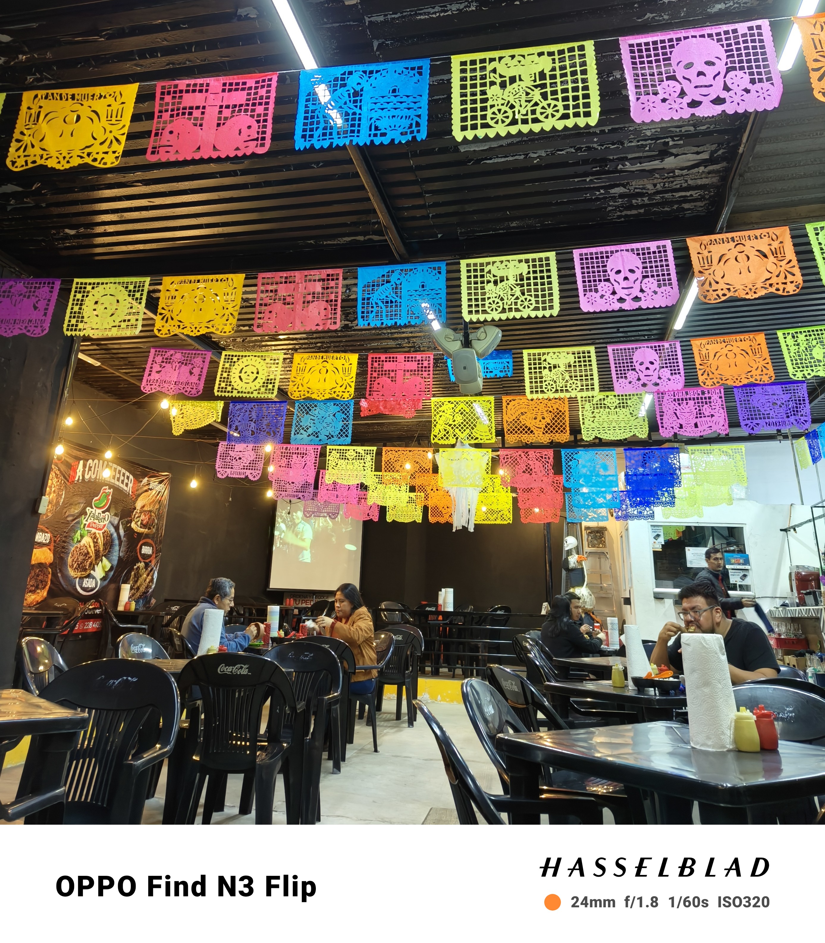 a small Mexican taco restaurant, decorated for the upcoming