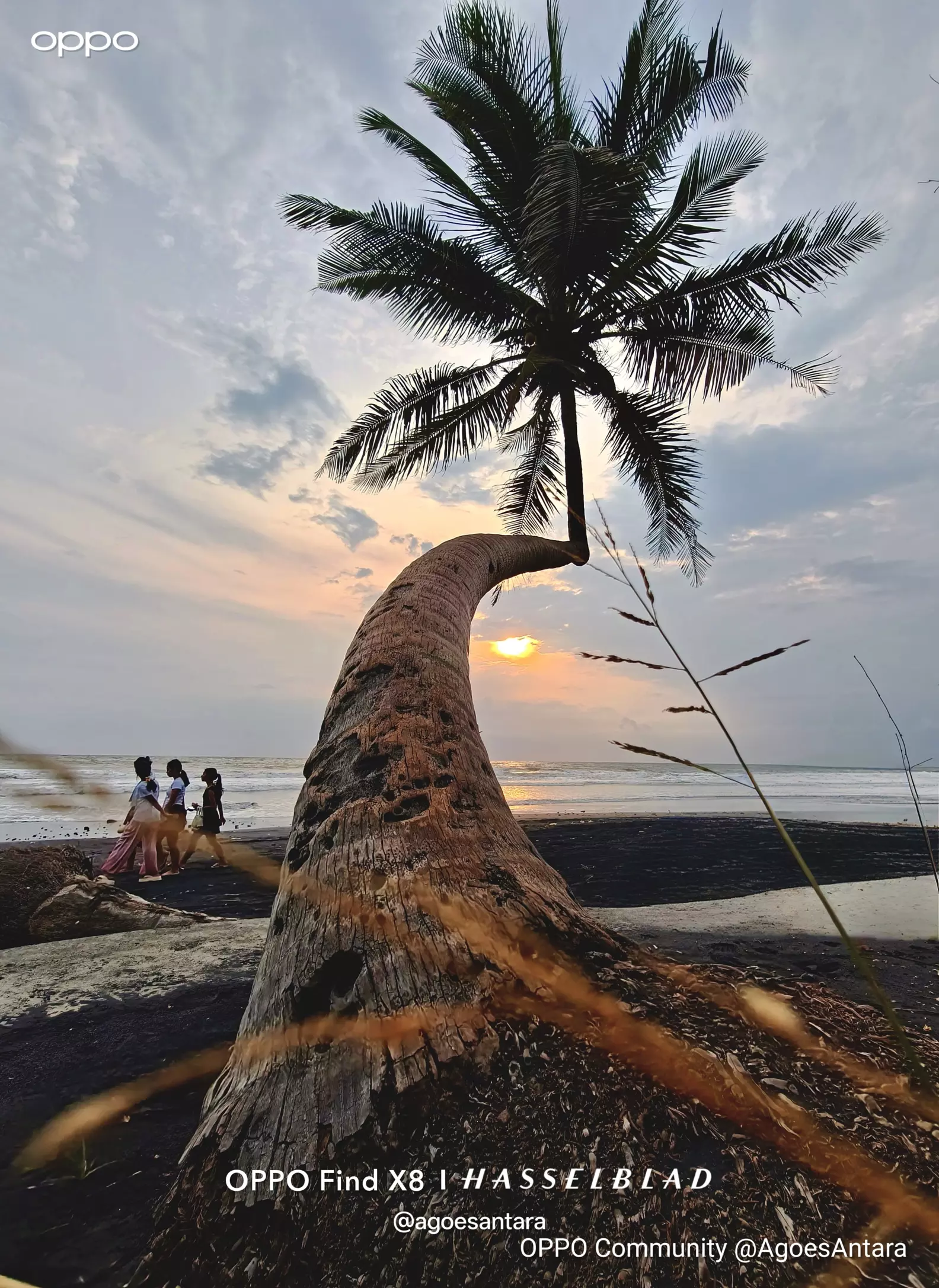 Enjoying the sunset on the black sandy beach even when the w